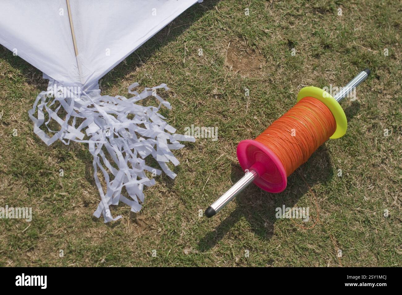 Kite and thread roller Pune Maharashtra India Asia Stock Photo - Alamy