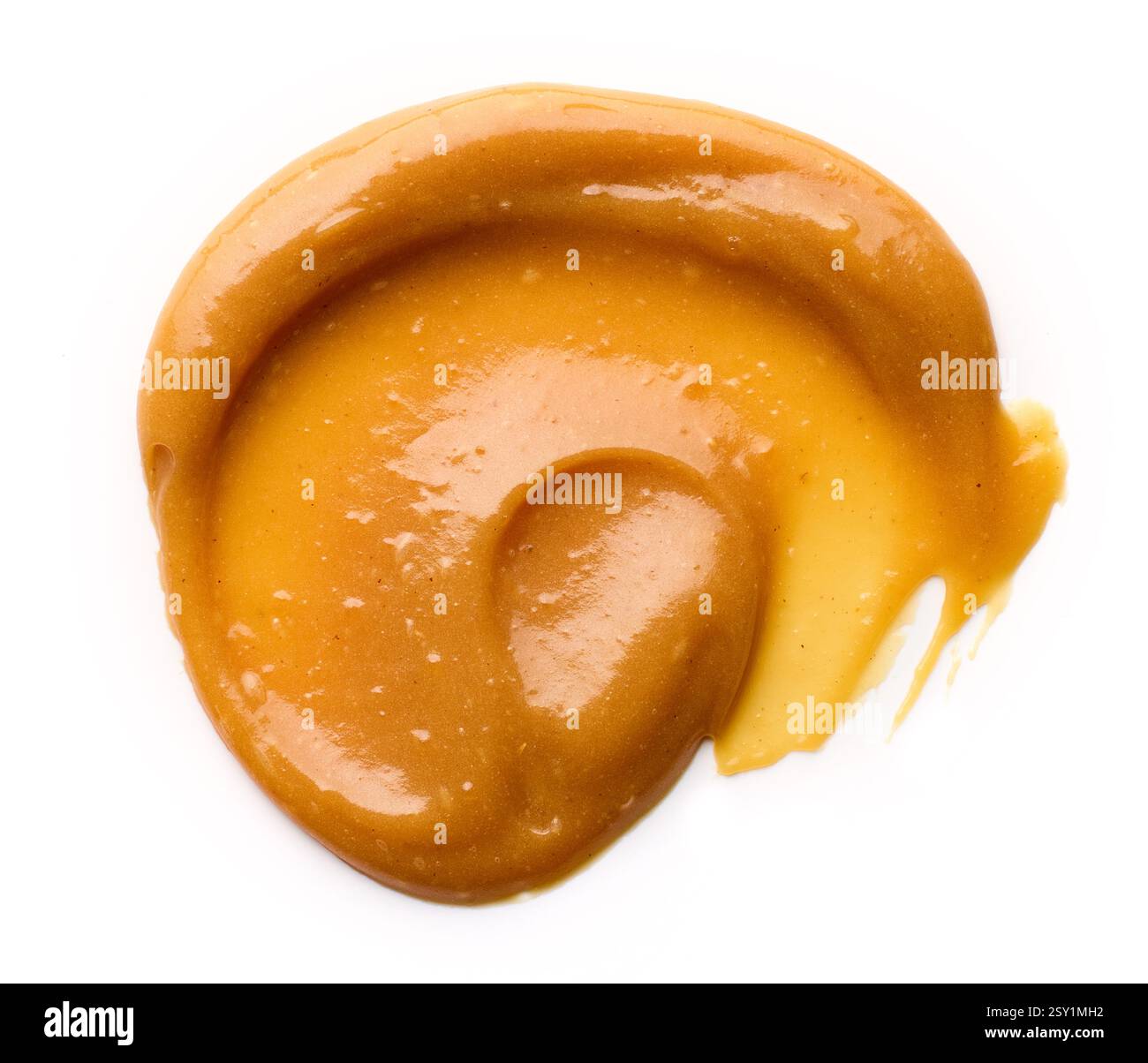 Smear of tasty caramel paste on white background, top view Stock Photo ...