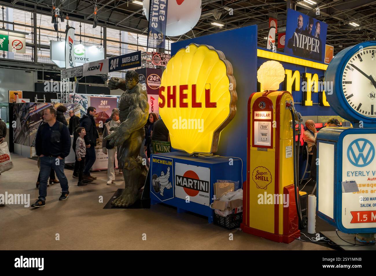 Vibrant exhibition showcasing classic gas stations and vintage ...