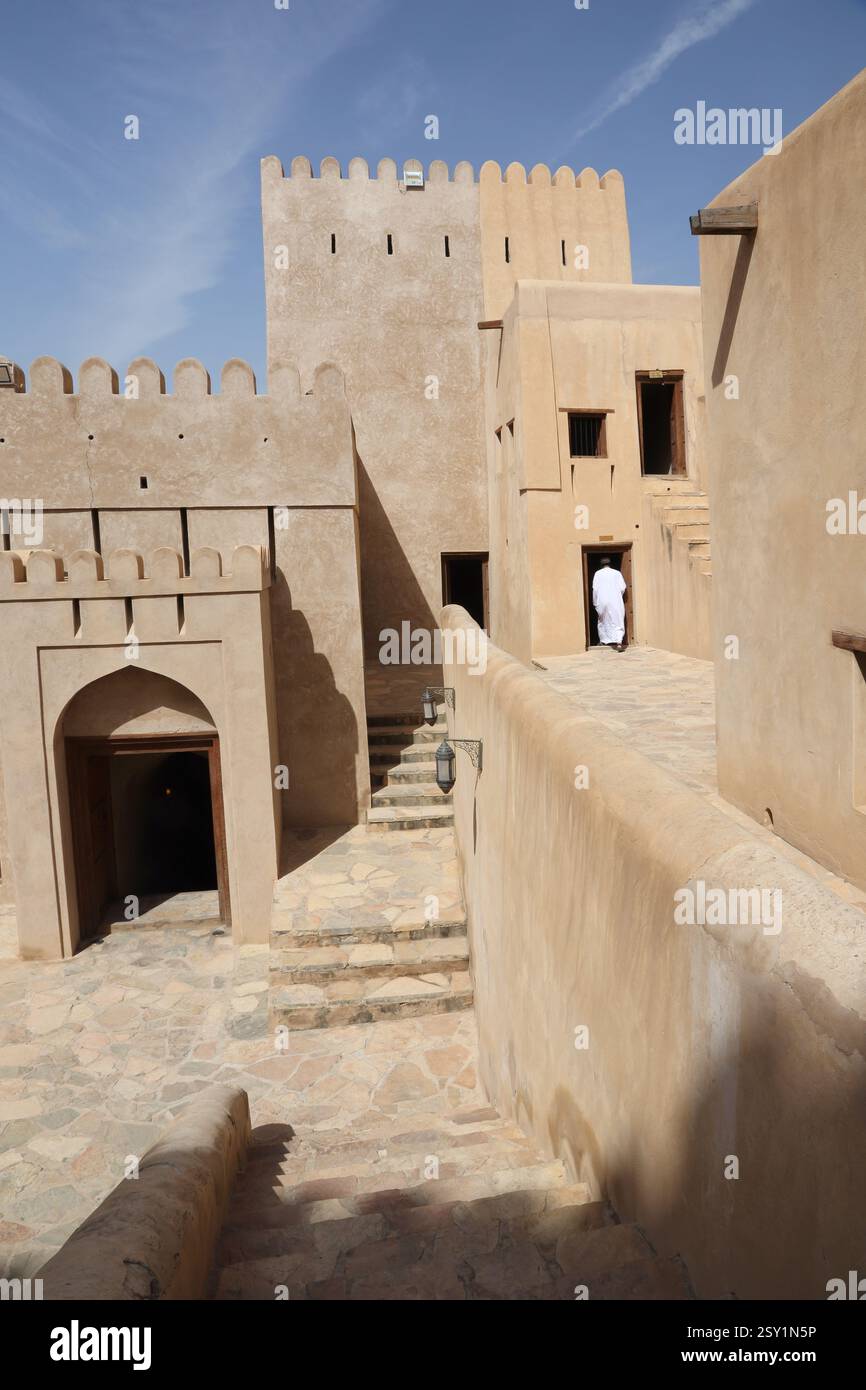Omani Man At doorway in Ancient 17th Century Nizwa Fort Oman Stock ...