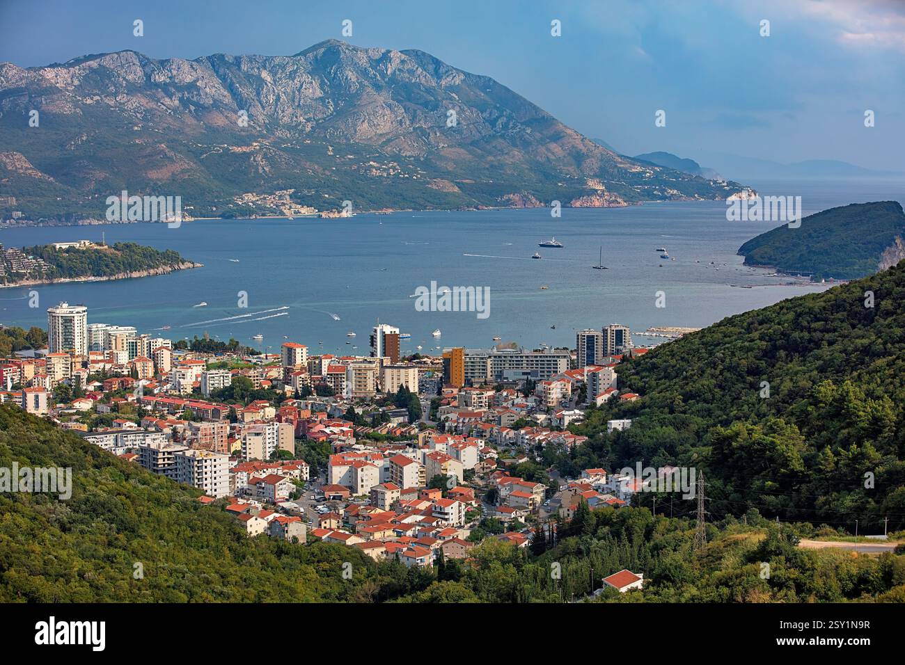 A stunning coastal view of a bay surrounded by mountains in the ...