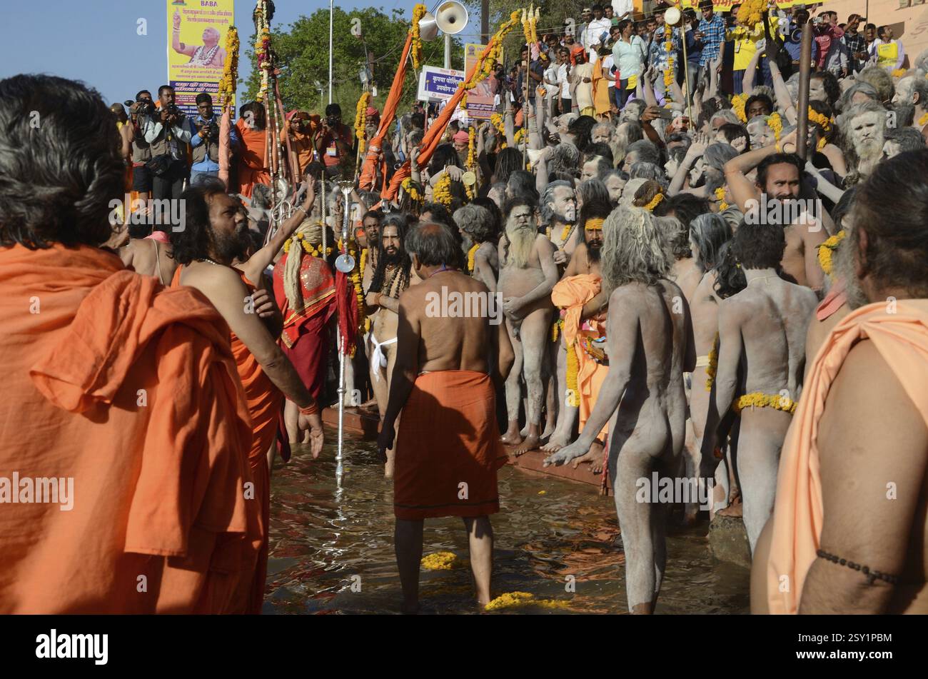 Naga sadhus standing near river, kumbh mela, Ujjain, Madhya pradesh ...