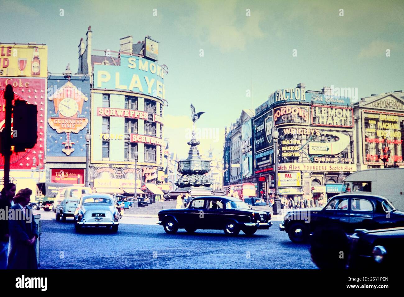 Piccadilly Circus circa 1960 showing advertising signage and cars circa 1950 - 1960s Stock Photo ...