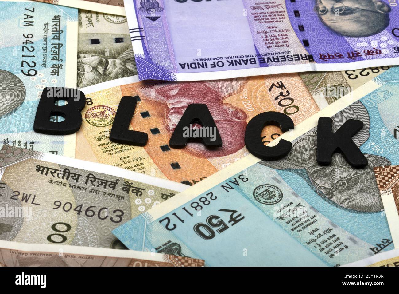 Black money concept, black alphabet on money background, Indian ...