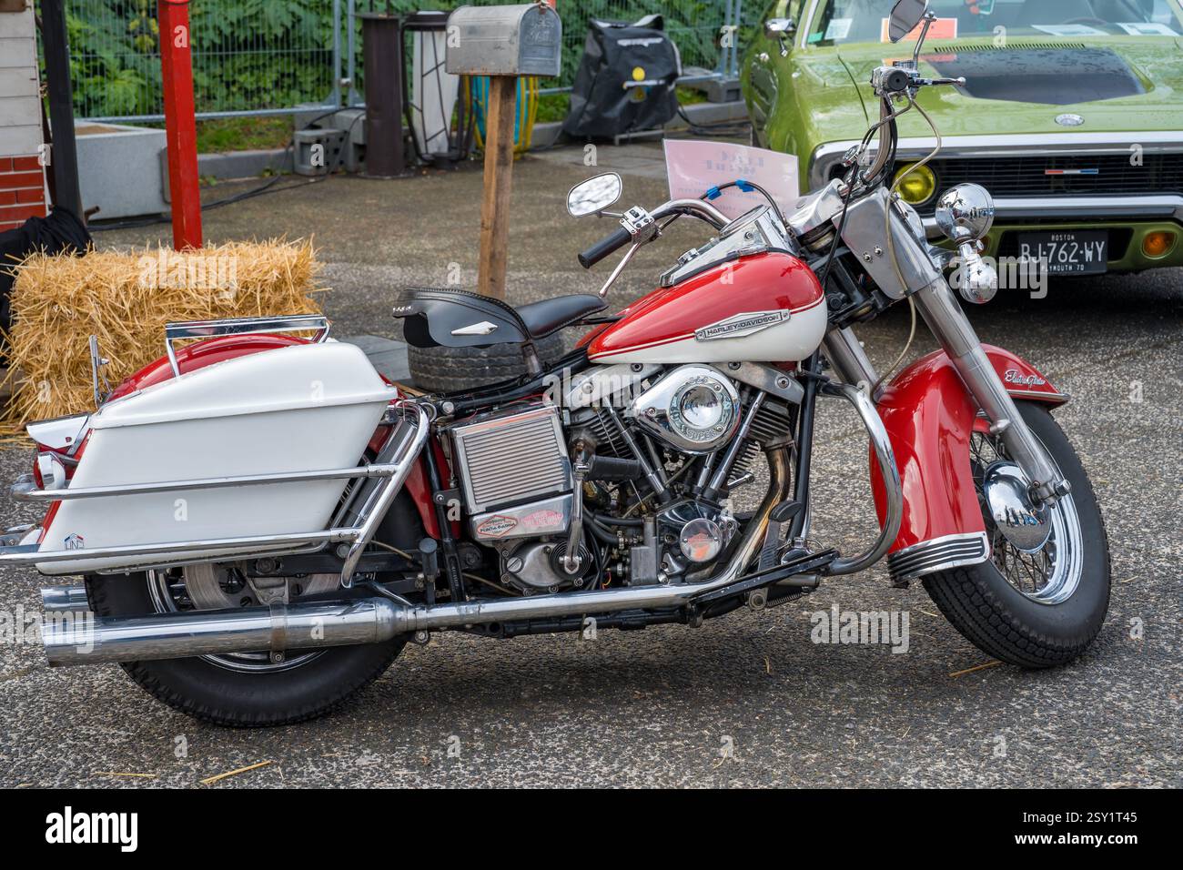 Classic motorcycle stands proudly at an outdoor vintage car event Stock ...