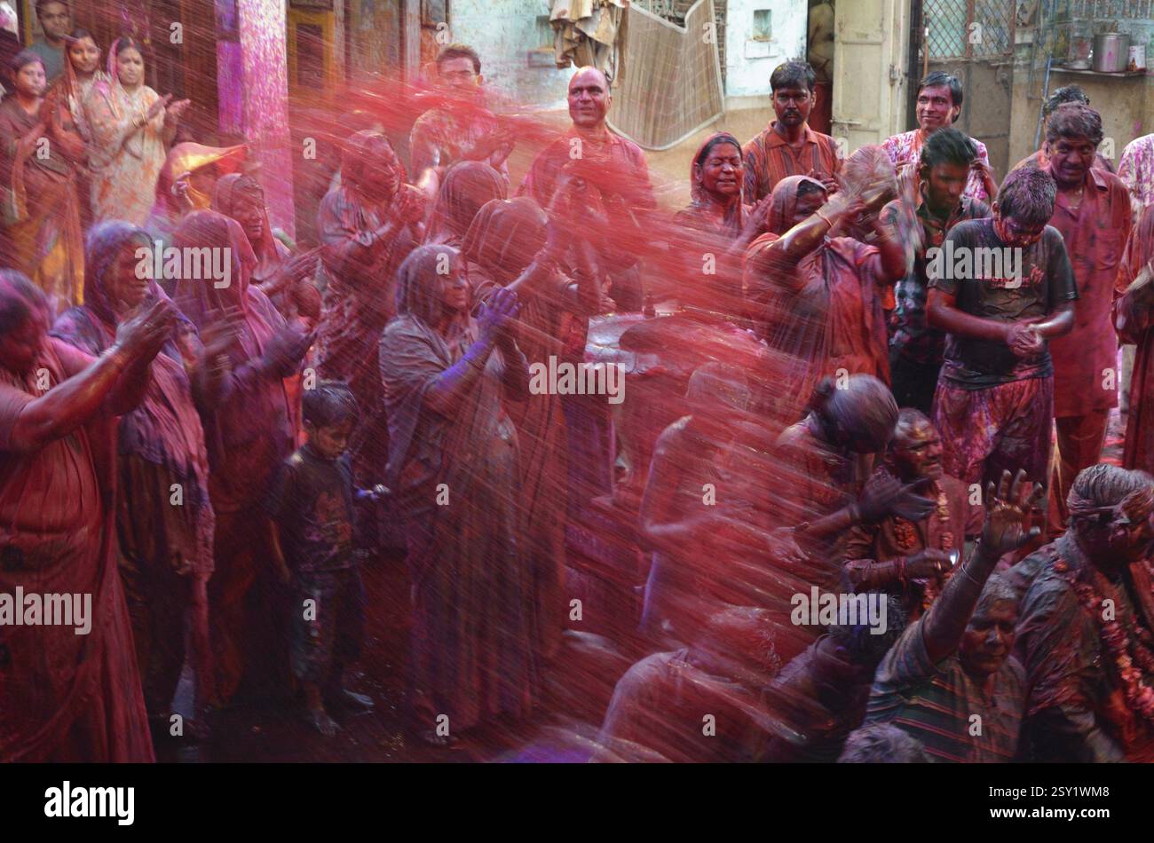 Priest spraying red colour on devotees in ghanshyam temple Jodhpur ...