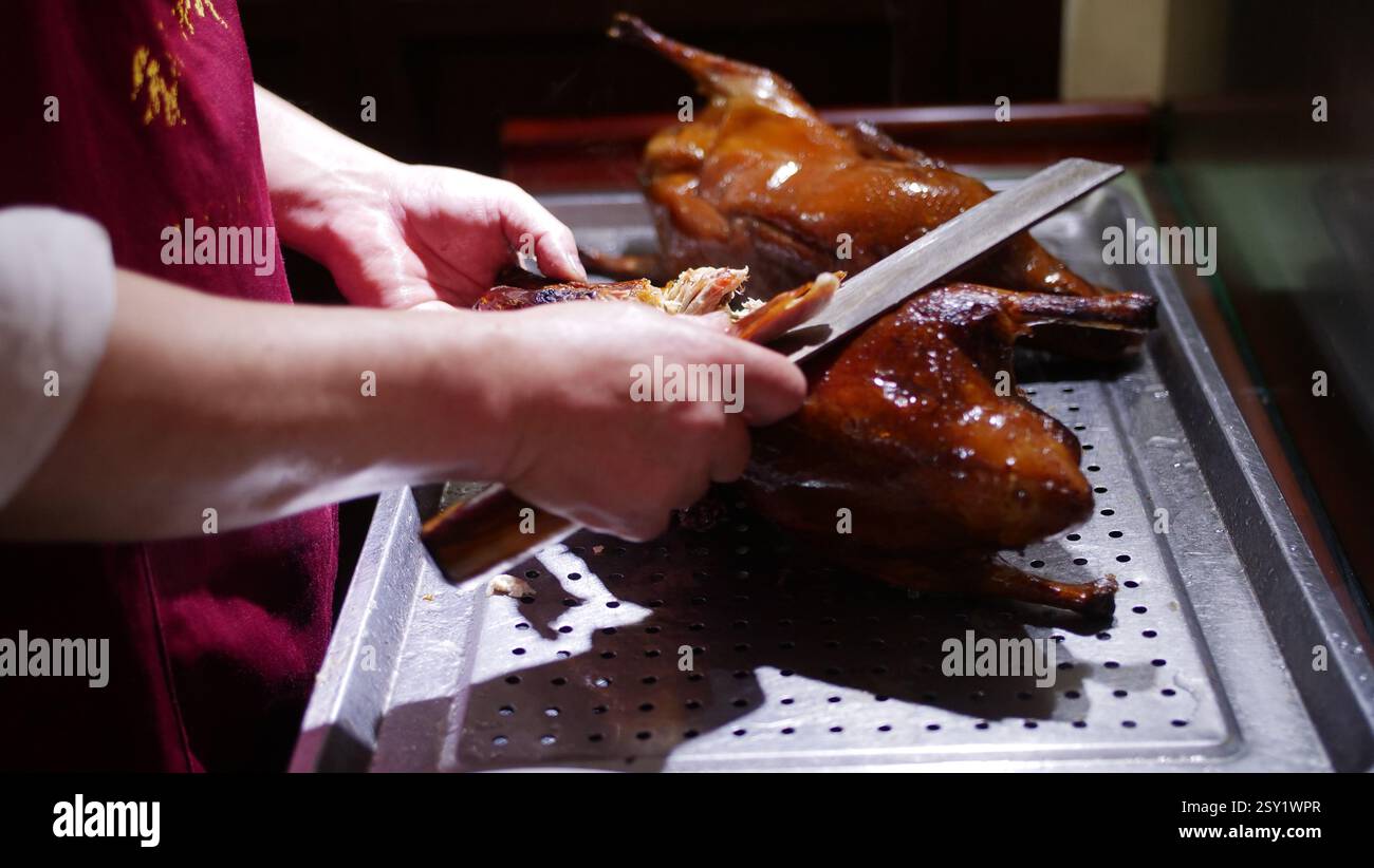 Peking duck in preparation Stock Photo - Alamy
