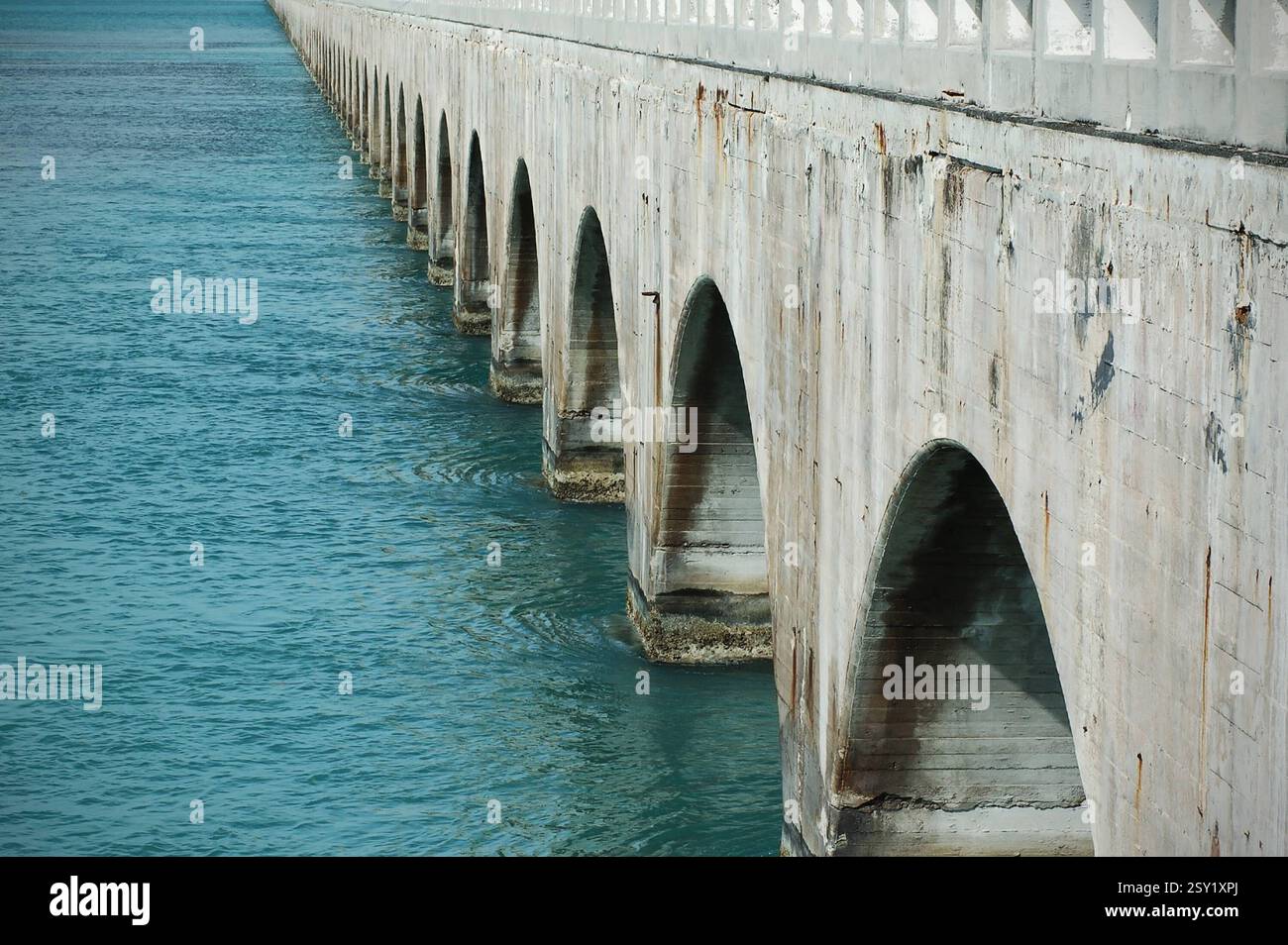 Concrete bridge with arches Arches under a concrete bridge, along the ...