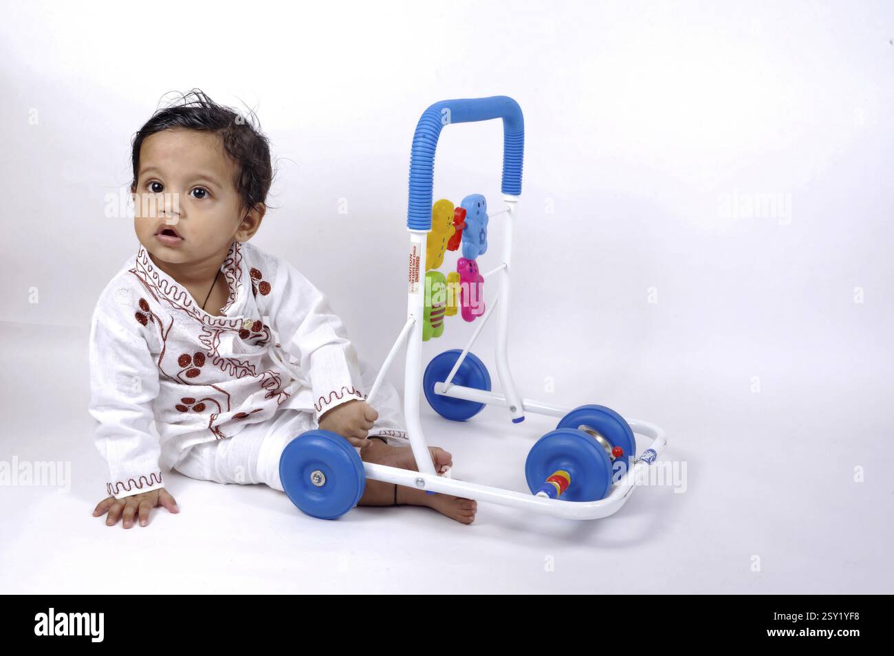 Child playing with walker, india, asia, mr#556 Stock Photo - Alamy