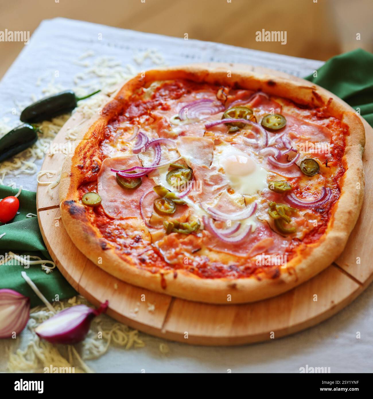 pizza with cured ham, egg, cheese, tomatoes, copy space, moc up Stock ...