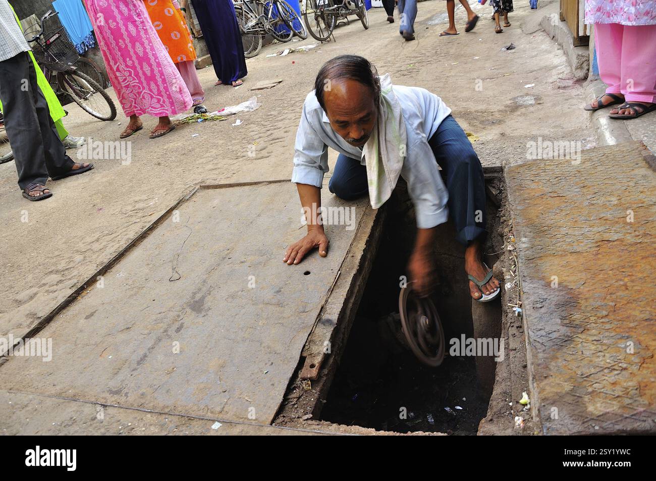 Man open turning wheel Stock Photo - Alamy