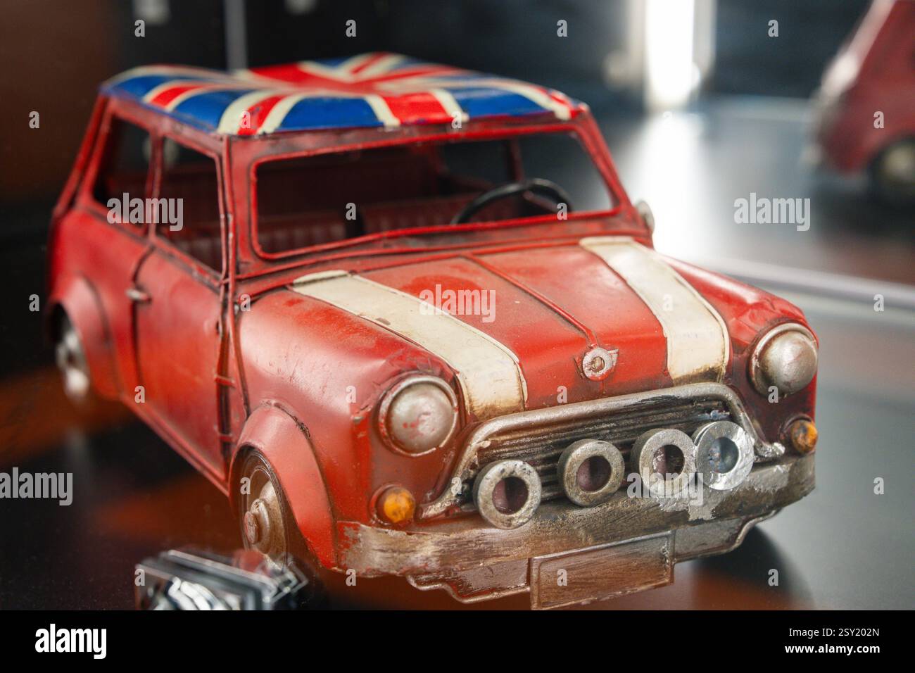 Retro British Mini Cooper model with Union Jack roof on display in a ...