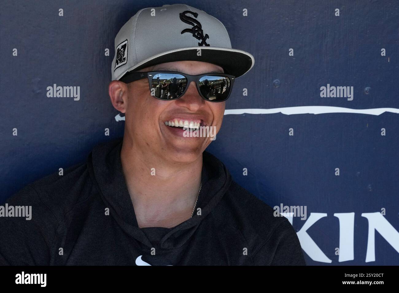 Chicago White Sox manager Will Venable smiles in the dugout prior to a ...