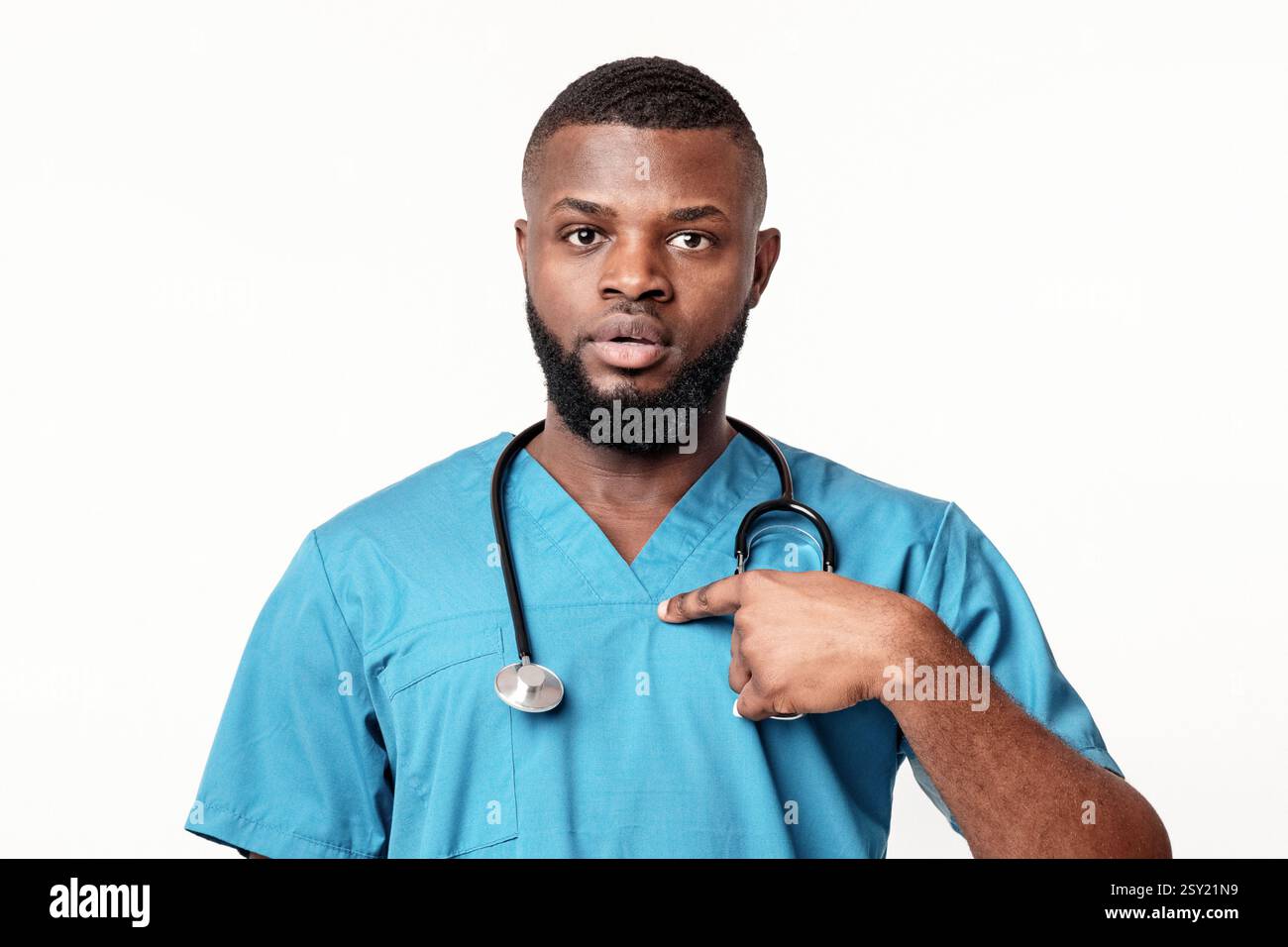 Surprised african man doctor pointing at himself Stock Photo - Alamy