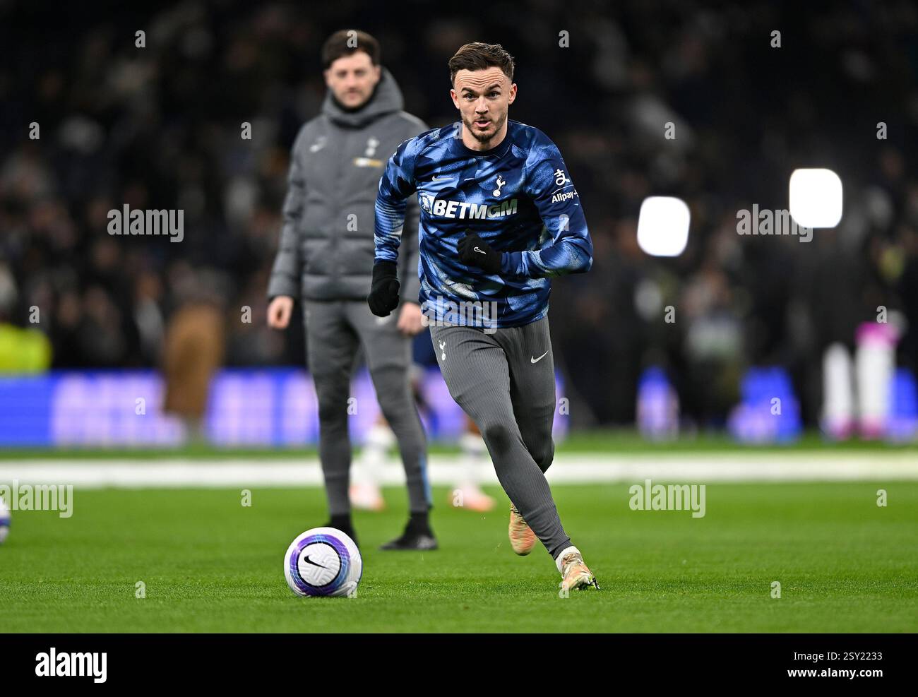 London, UK. 26th Feb, 2025. James Maddison of Tottenham Hotspur warms ...