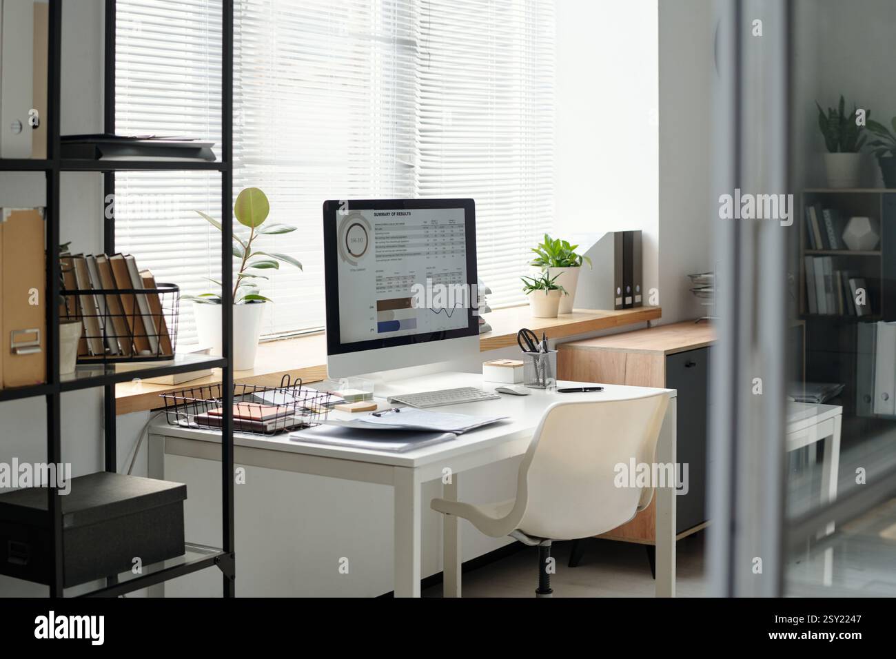 Small Office Workplace with Statistics Graphics on PC Screen Stock ...