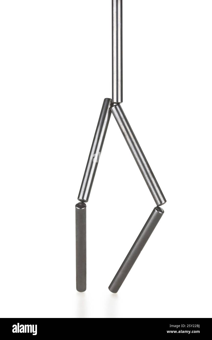 Balancing of rods, india, asia Stock Photo - Alamy