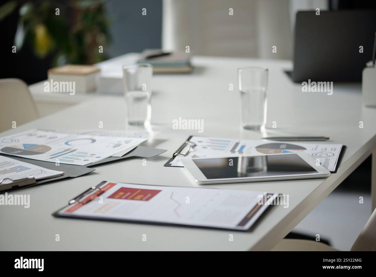 Meeting Table with Documents Stock Photo - Alamy