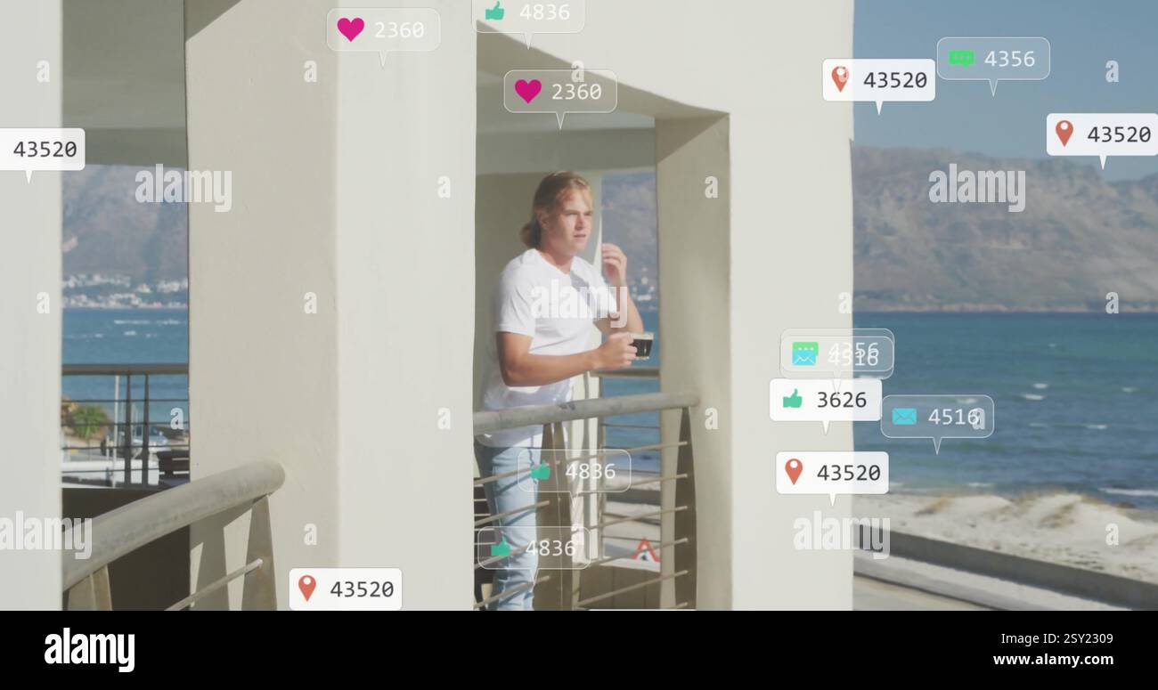 Image of media icons over caucasian man with cup of coffee at seaside ...