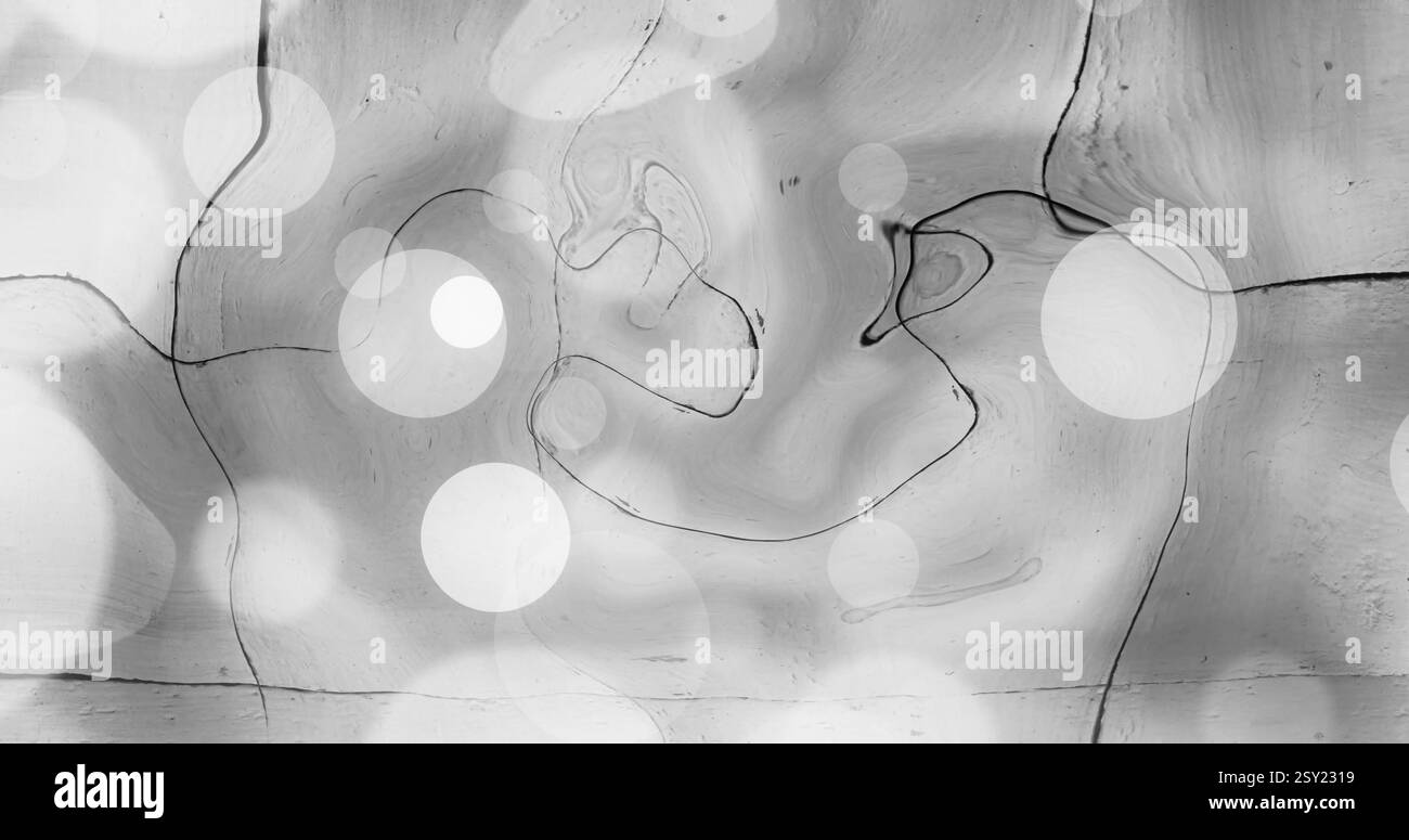 Image of white spots over grey liquid background Stock Photo - Alamy