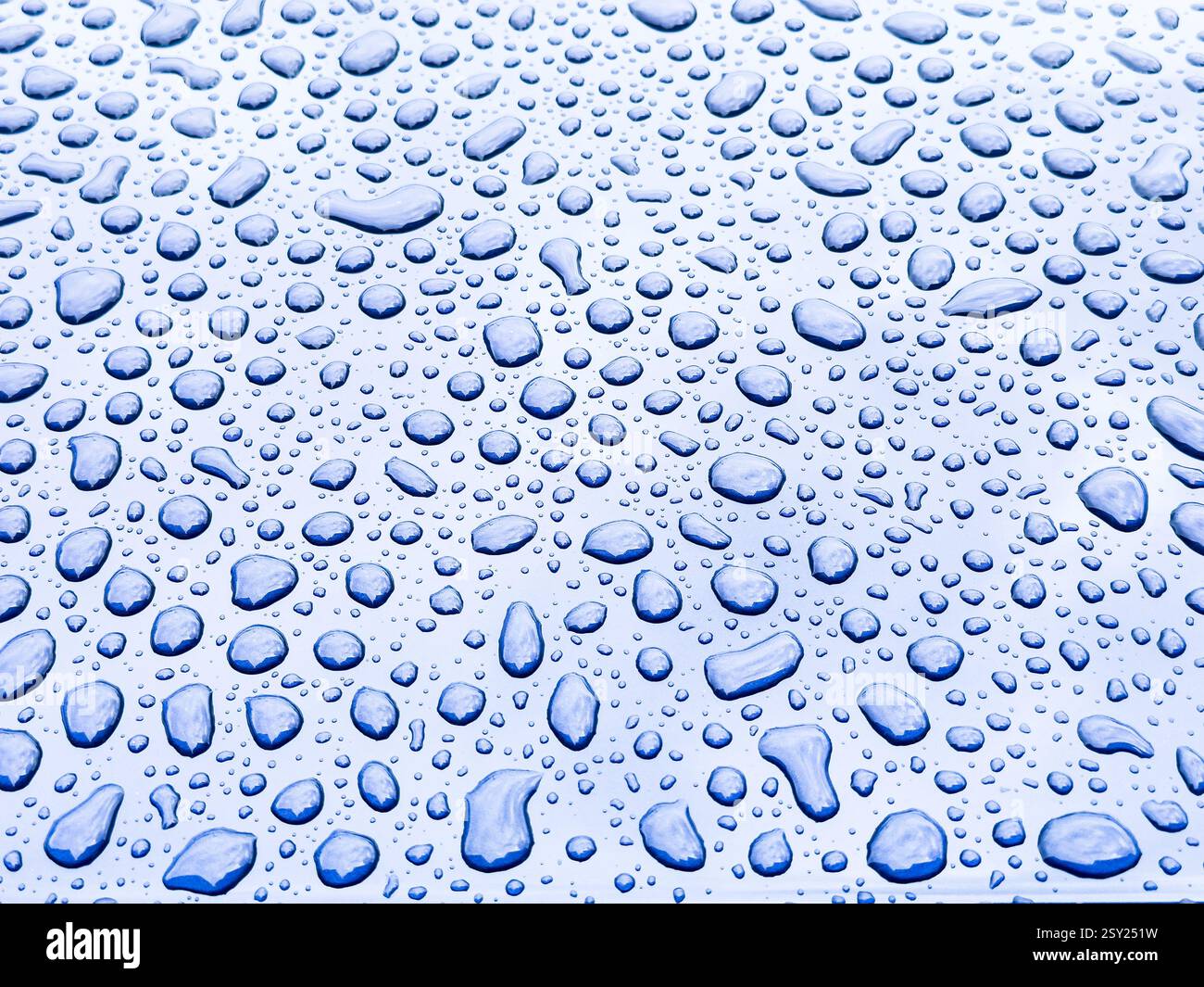 Wet blue surface with drops Stock Photo - Alamy