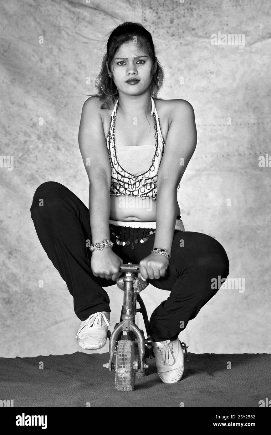 Woman riding cycle in circus, india, asia Stock Photo - Alamy
