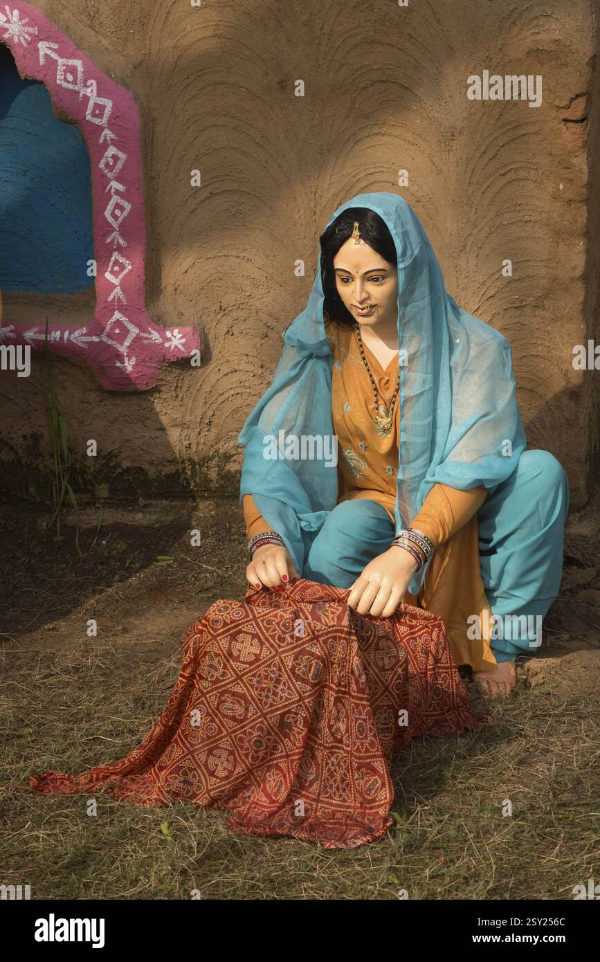 Statue of woman washing cloth, surajkund mela, faridabad, haryana ...