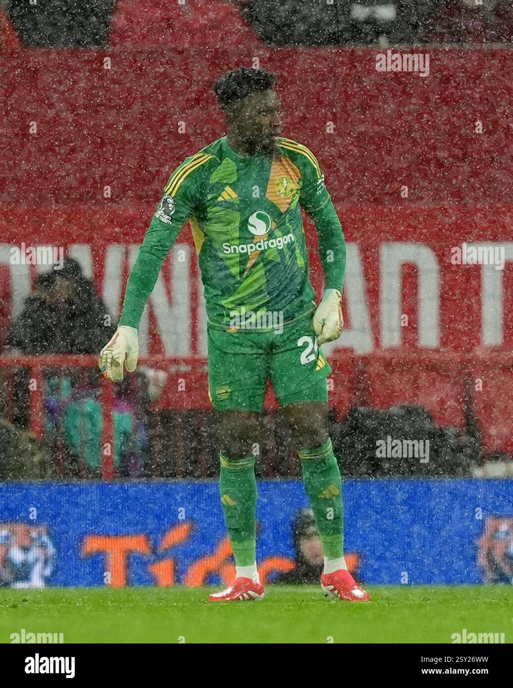 Manchester United goalkeeper Andre Onana looks dejected after conceding ...
