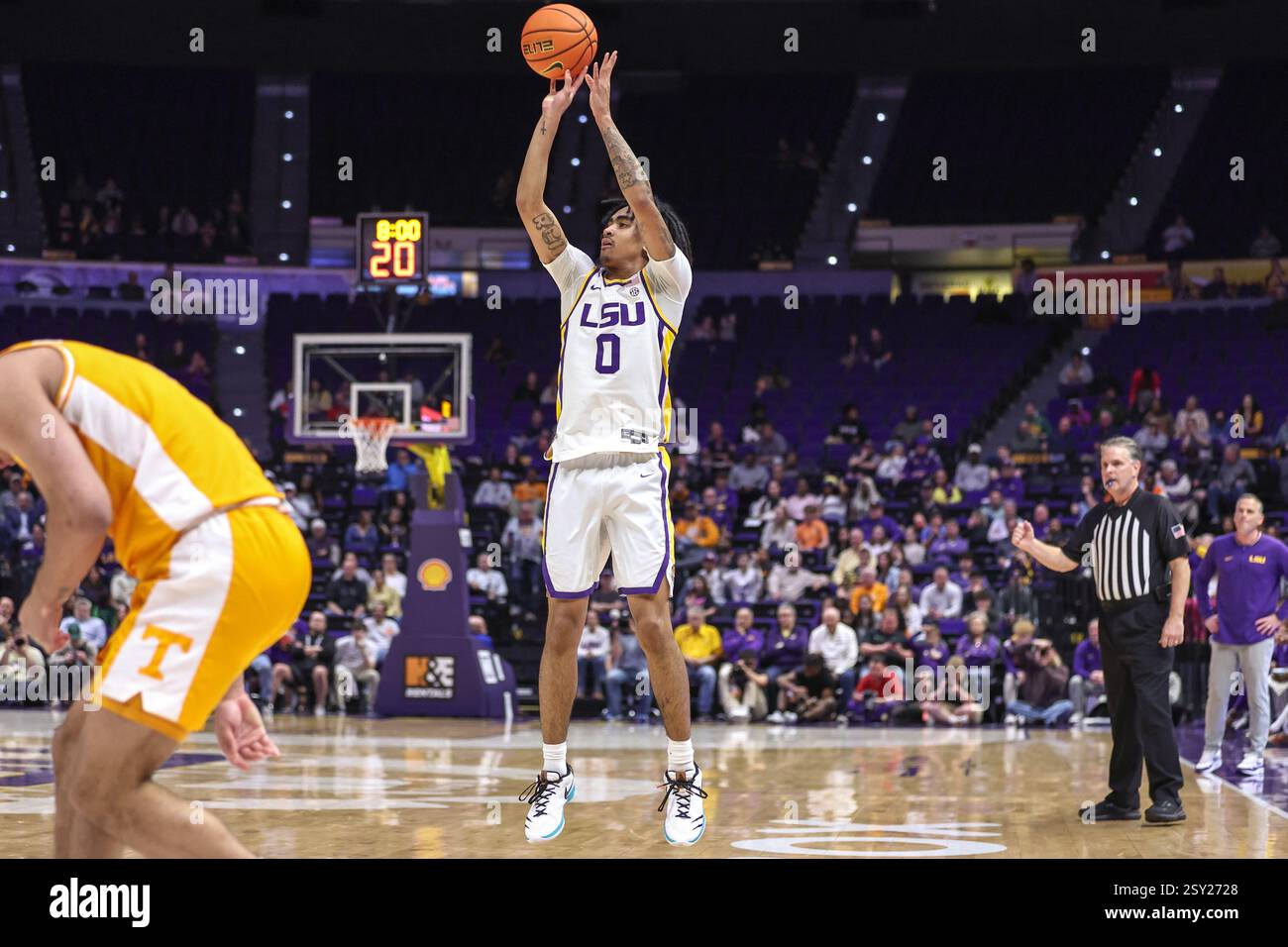 Baton Rouge, LA, USA. 25th Feb, 2025. LSU's Vyctorius Miller (0) puts ...