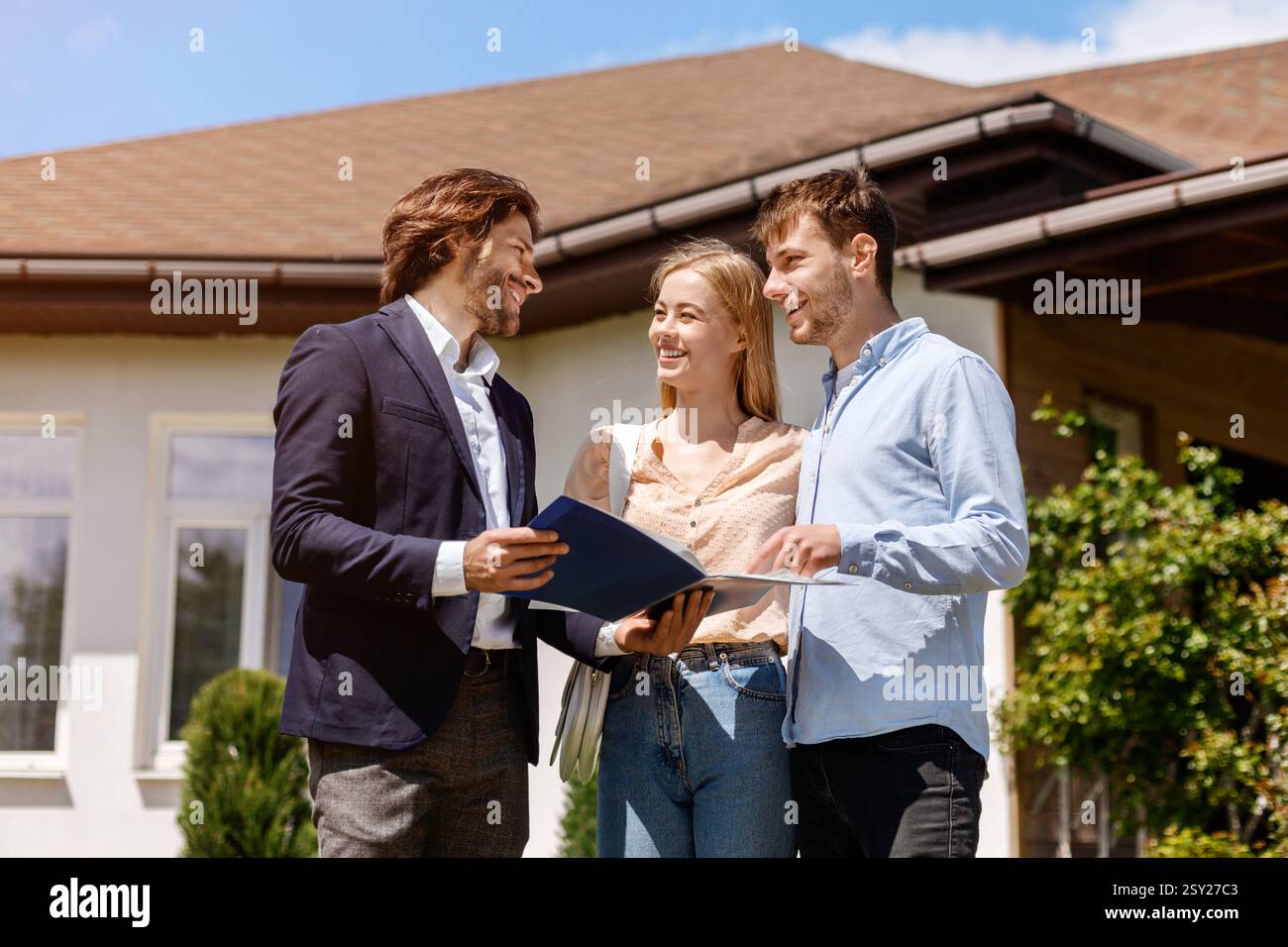 Real estate agent showing home rental or purchase contract to his ...
