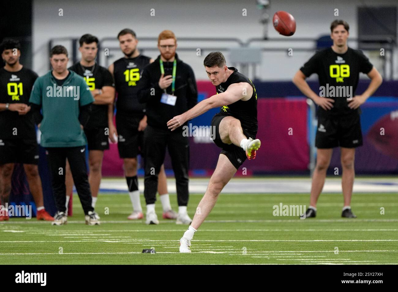 Kicker Mark McNamee, from Ireland, participates in a drill at the NFL ...