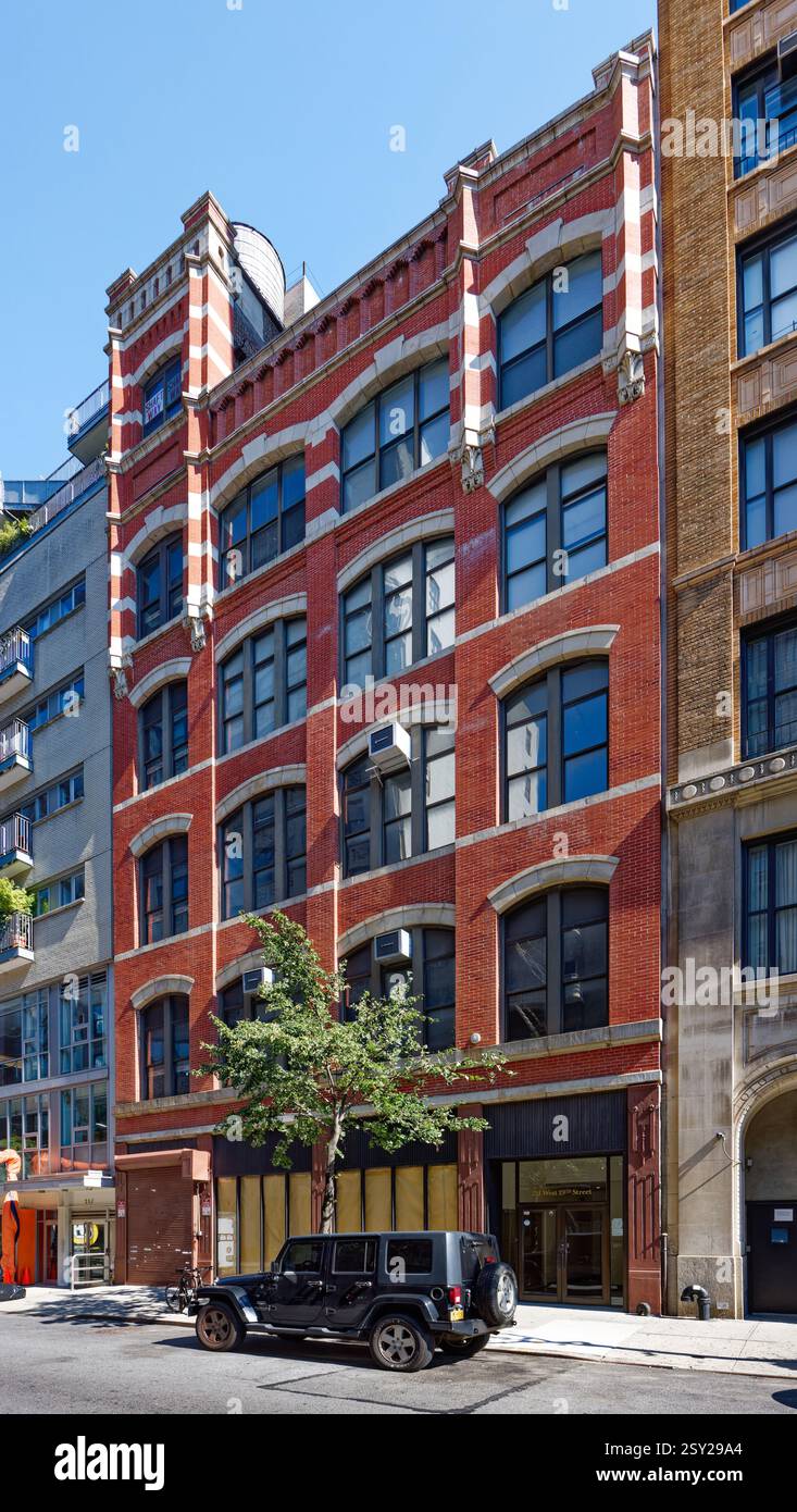 211 West 19th Street is a red brick loft building with stone accents ...