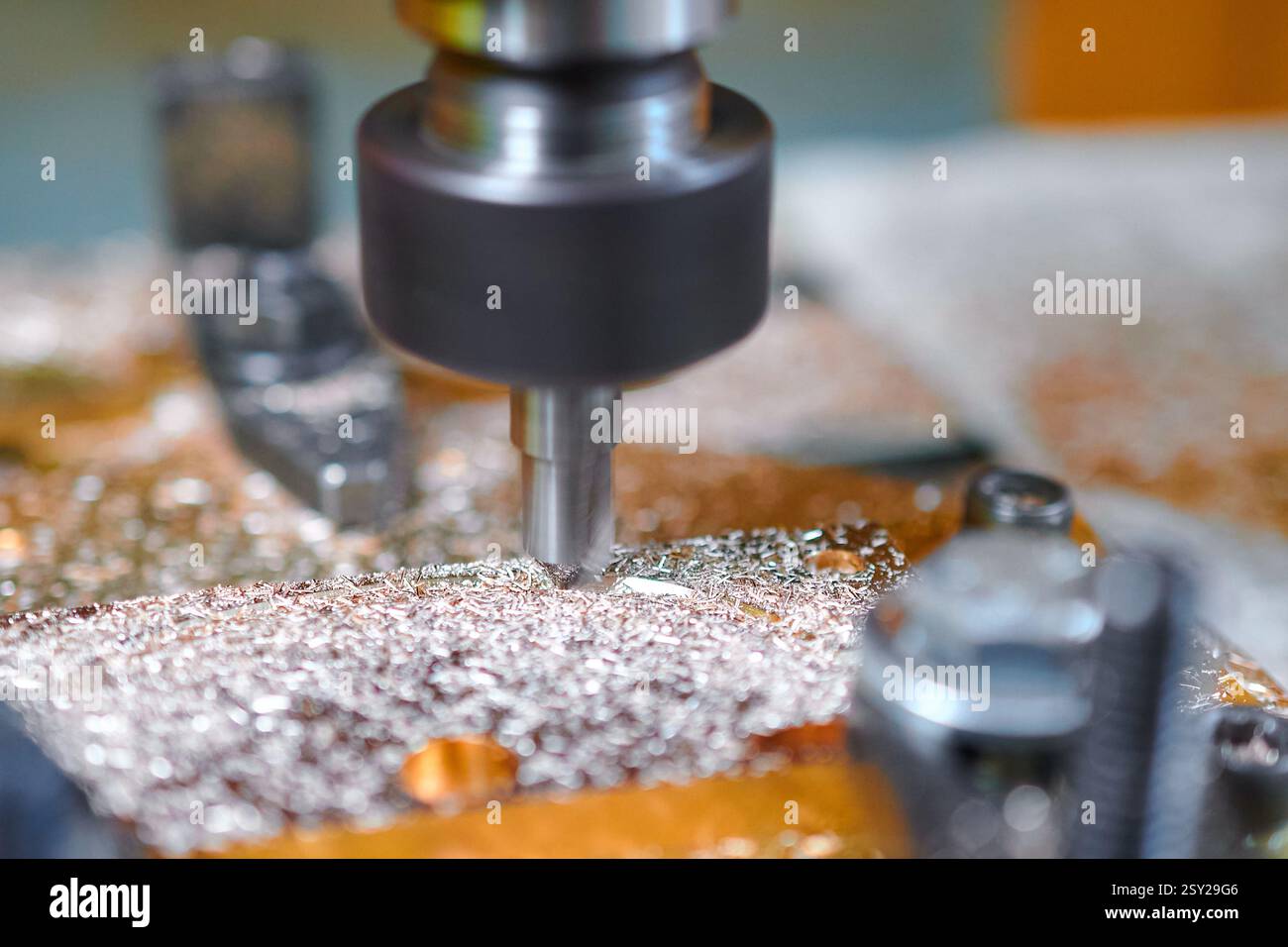 Precision milling machine crafts intricate clockwork components in a ...