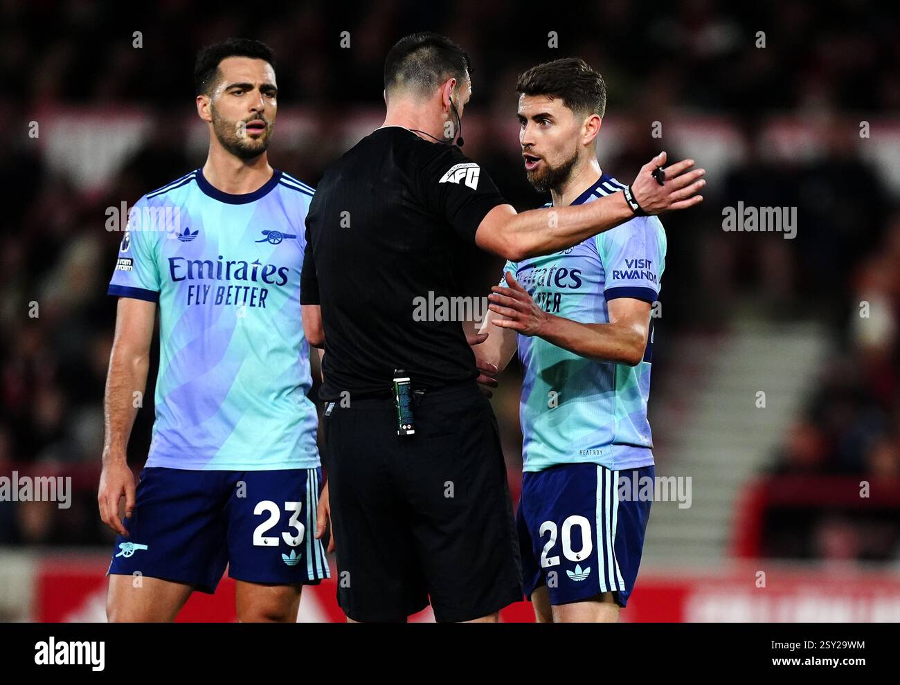 Referee Andrew Madley speaks to Arsenal's Jorginho during the Premier ...