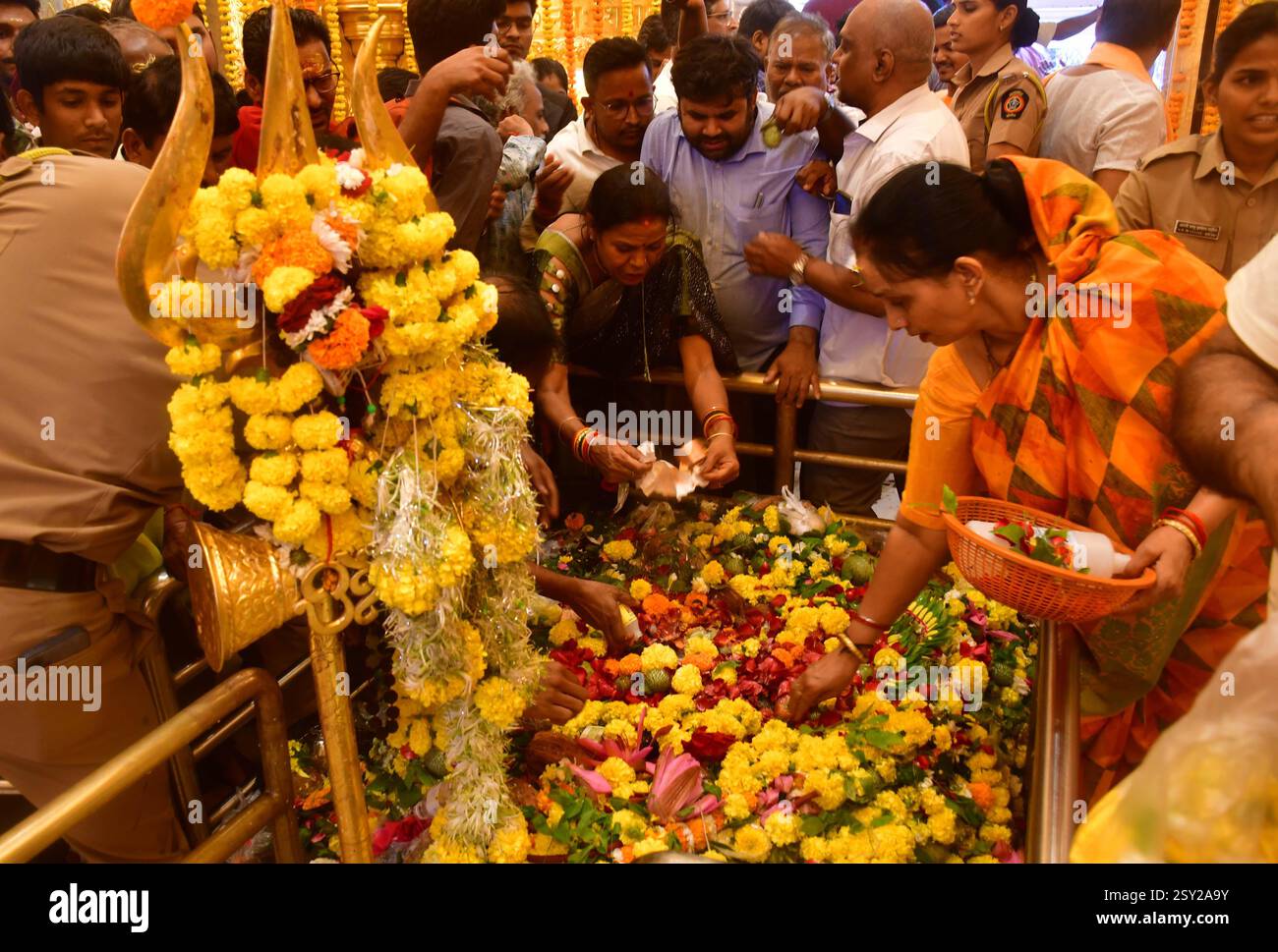 New Delhi, India. 26th Feb, 2025. MUMBAI, INDIA - FEBRUARY 26: Devotees ...