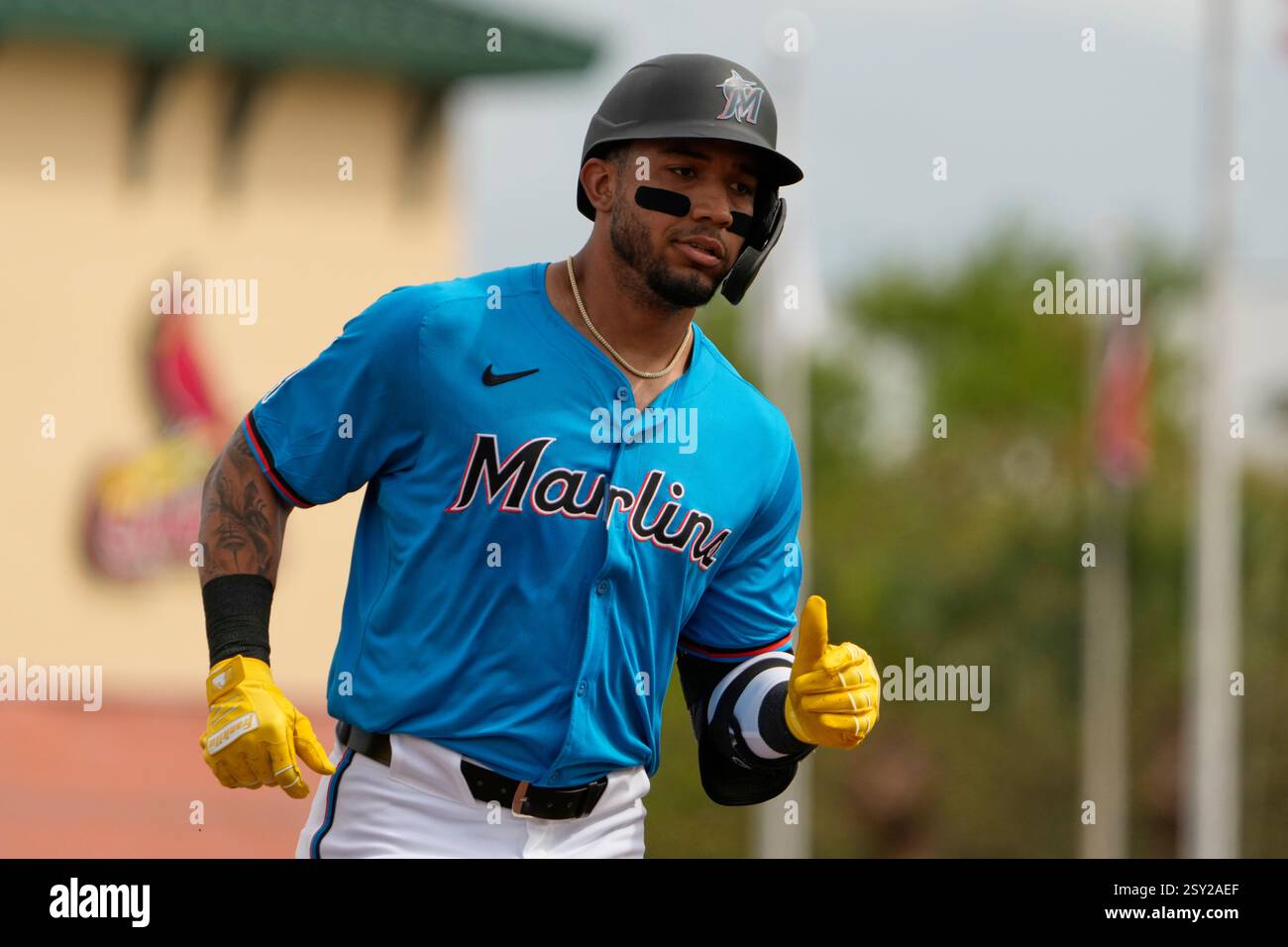 Miami Marlins' Max Acosta rounds the bases after hitting a solo home ...