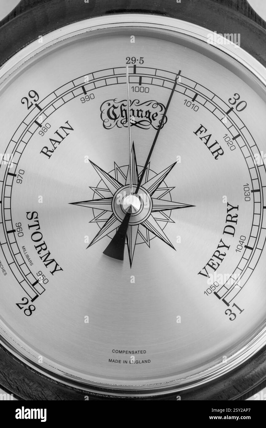 Close up of an aneroid barometer mounted on a wall Stock Photo - Alamy
