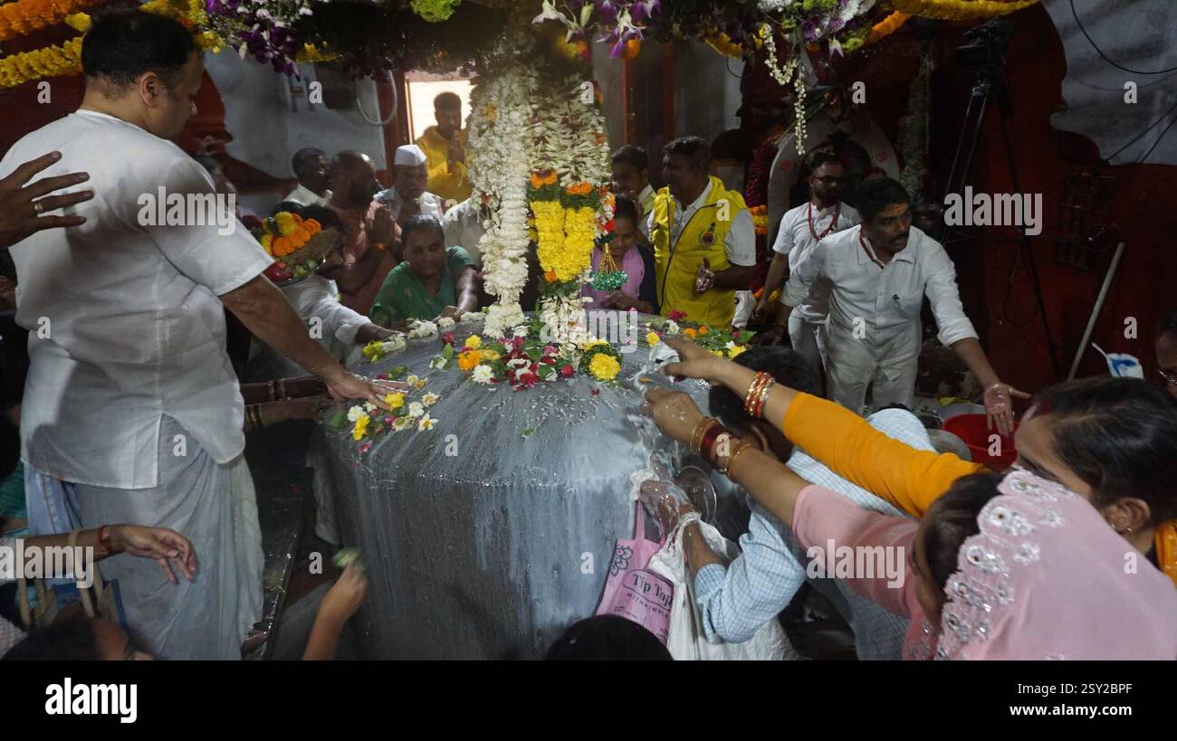 Devotees visiting temple lord hi-res stock photography and images - Alamy