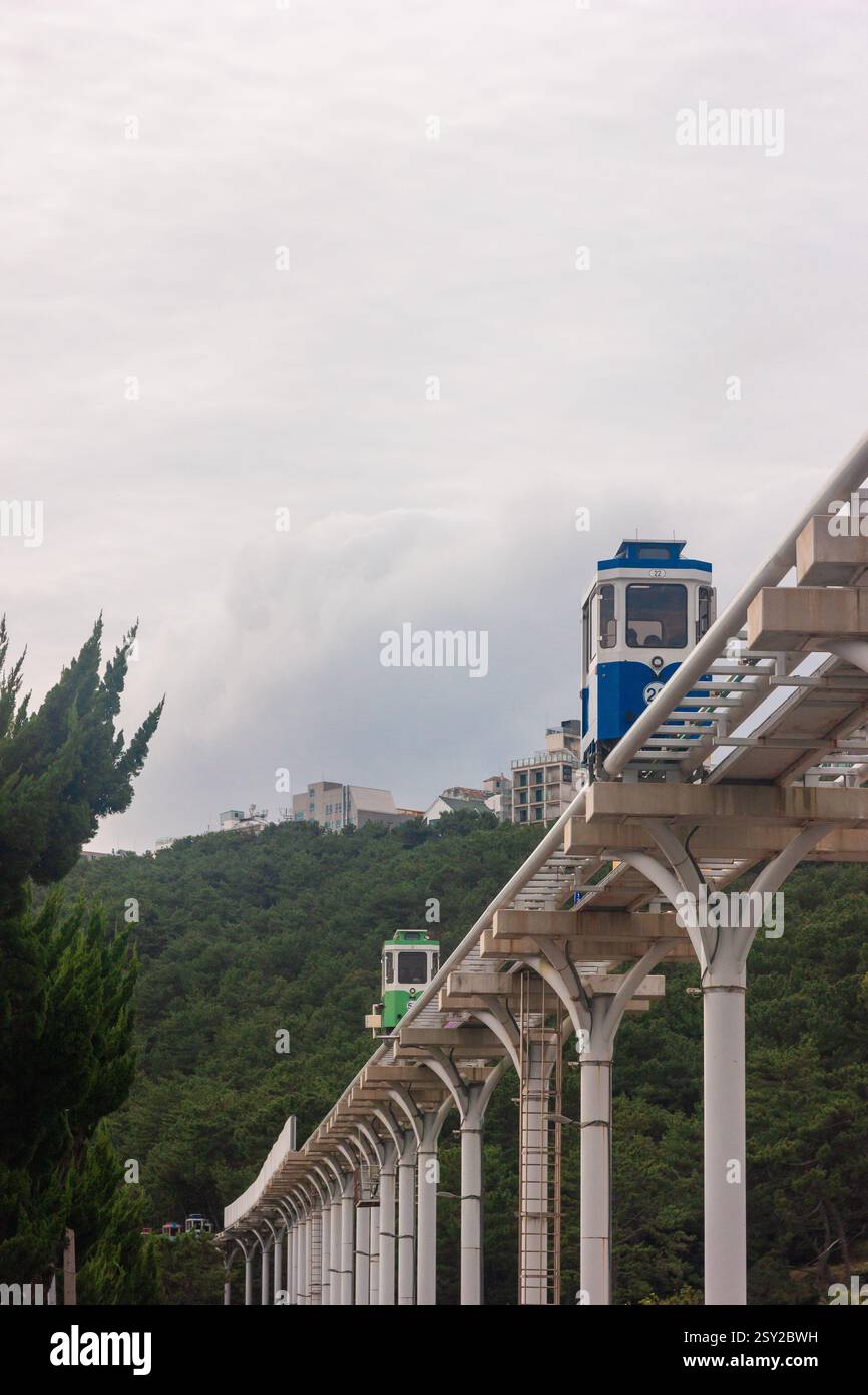 Busan, South Korea - October 29, 2024: Colorful sky capsule trains on ...