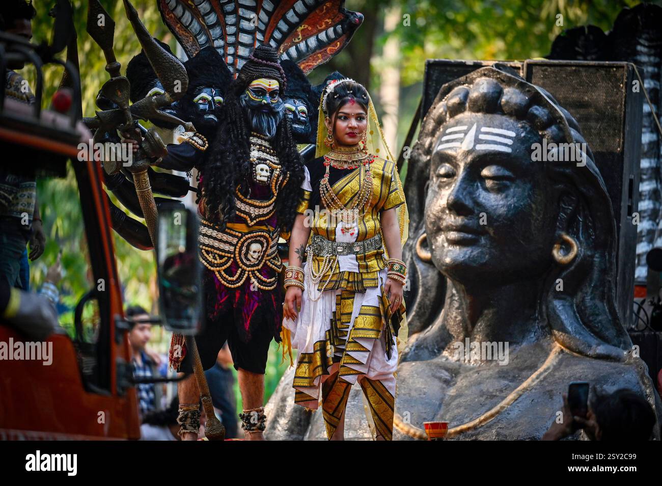 NEW DELHI, INDIA - FEBRUARY 26: Artists dressed as Lord Shiv performs during Shiv Barat (Lord ...