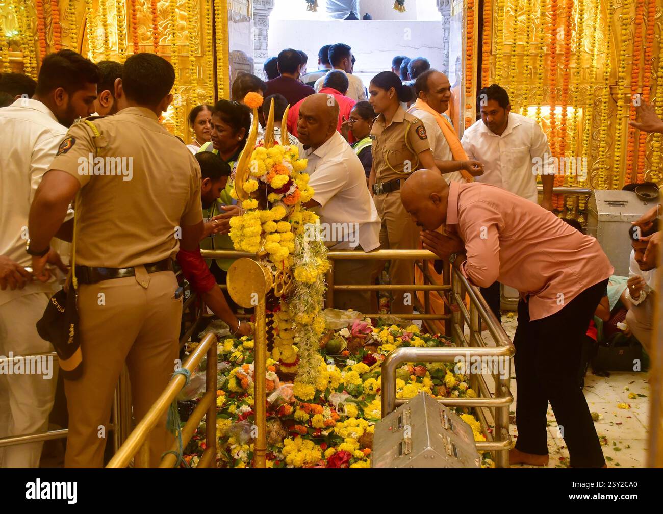 New Delhi, India. 26th Feb, 2025. MUMBAI, INDIA - FEBRUARY 26: Devotees ...