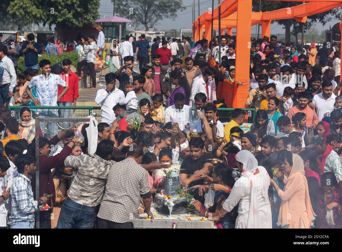NEW DELHI, INDIA - FEBRUARY 26: Hundreds of devotees arrive to offer ...