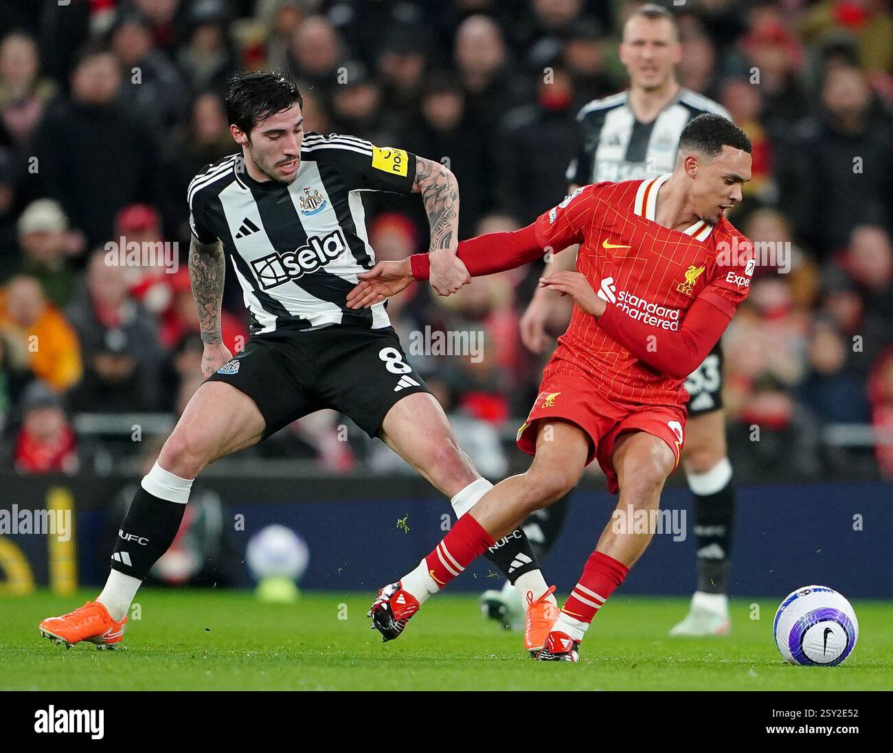Newcastle United's Sandro Tonali (left) and Liverpool's Trent Alexander ...