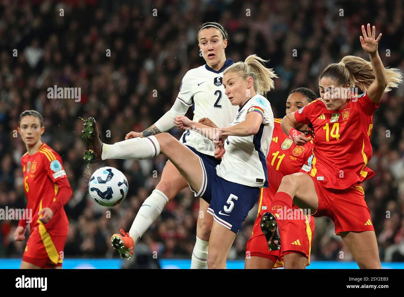 England's Leah Williamson, centre, kicks the ball during the Women's ...