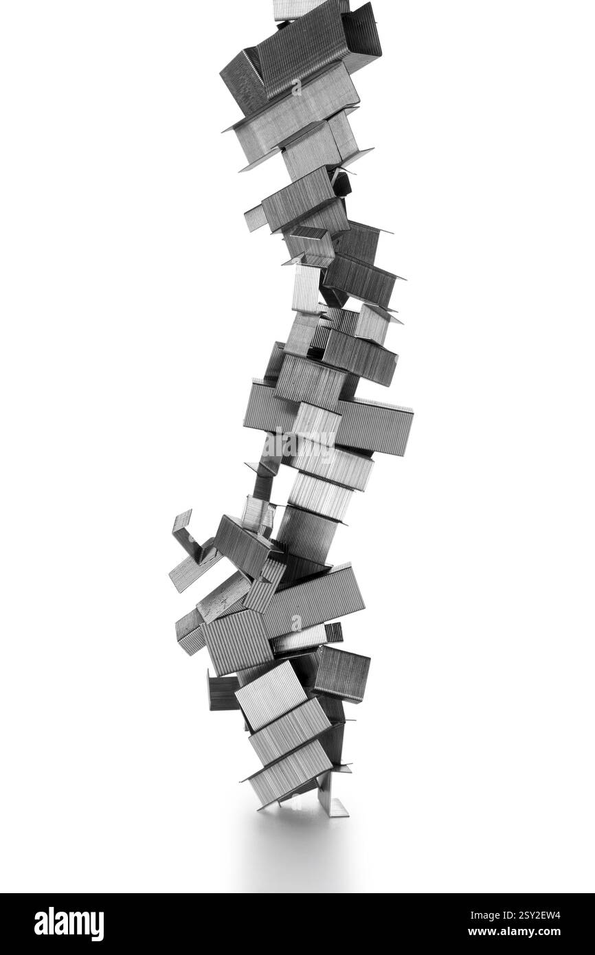 Balancing of stapler pin, india, asia Stock Photo - Alamy