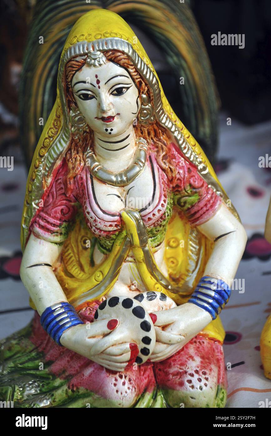 Terracotta woman playing musical instrument, west bengal, india, asia ...