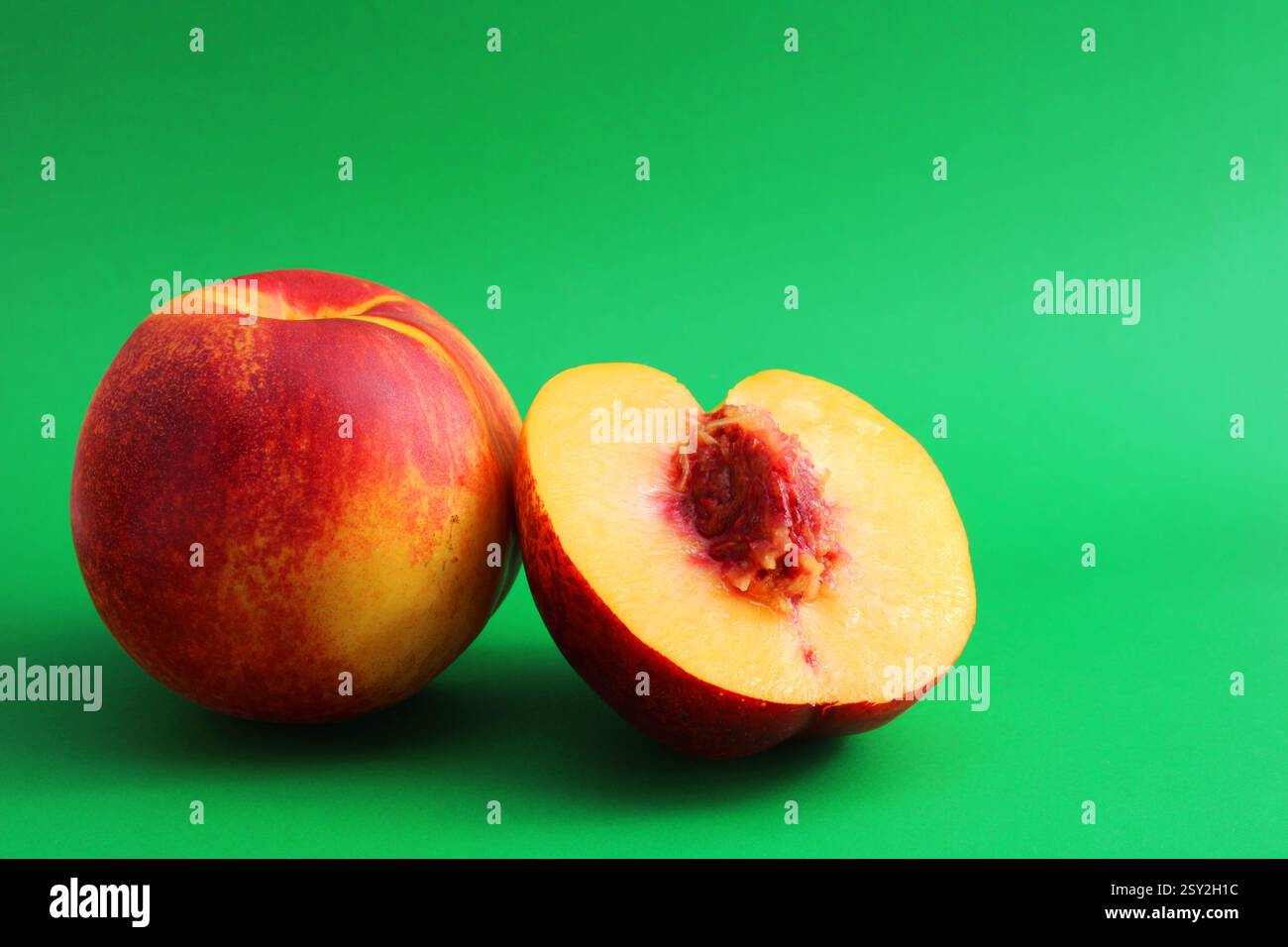Two juicy ripe peaches hi-res stock photography and images - Alamy
