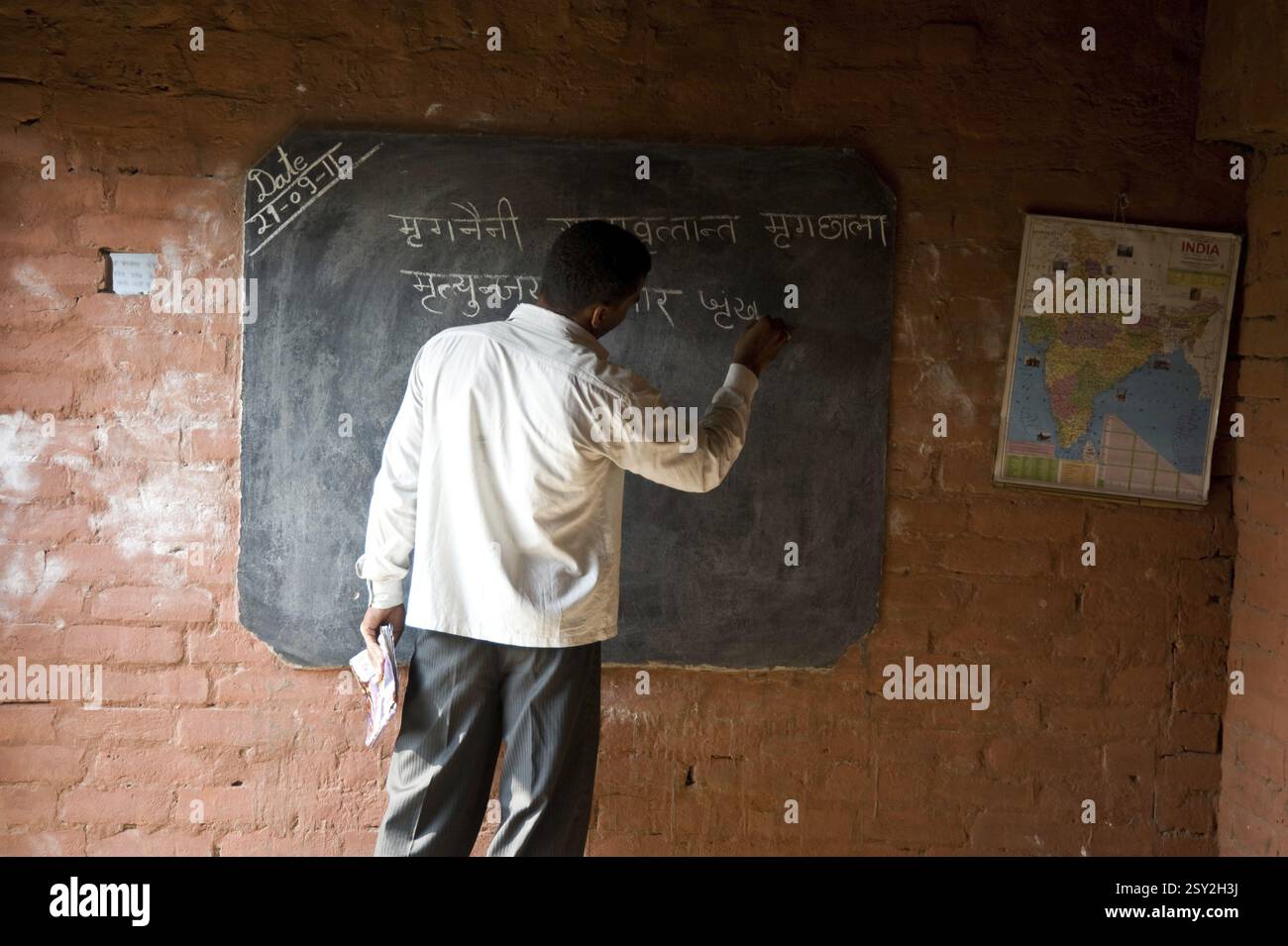 Teacher teaching in classroom uttar pradesh India Asia Stock Photo - Alamy
