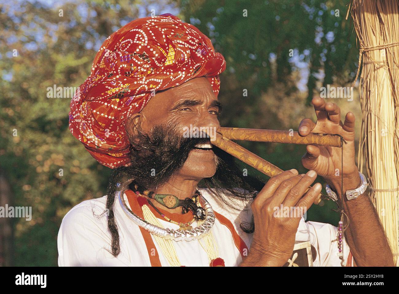 Playing flute from nose, rajasthan, india, asia Stock Photo - Alamy
