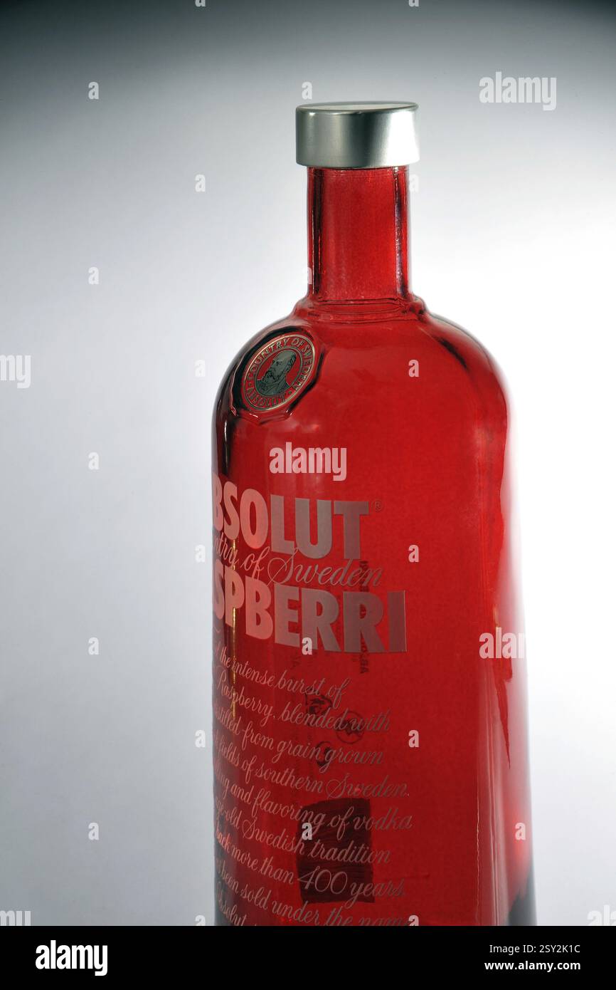 Raspberry coloured glass bottles, india, asia Stock Photo - Alamy